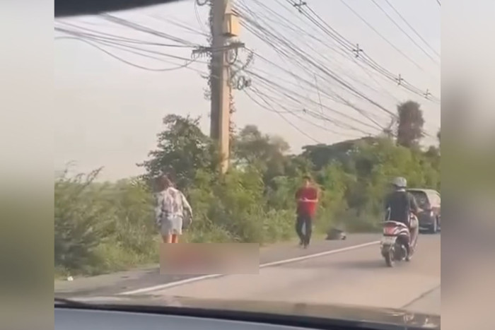 Bangkok Post - Woman runs down partner on motorcycle, stamps him