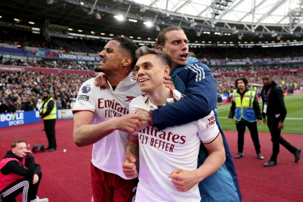 Bangkok Post - Arsenal on brink of Premier League title, Villa slip up ...