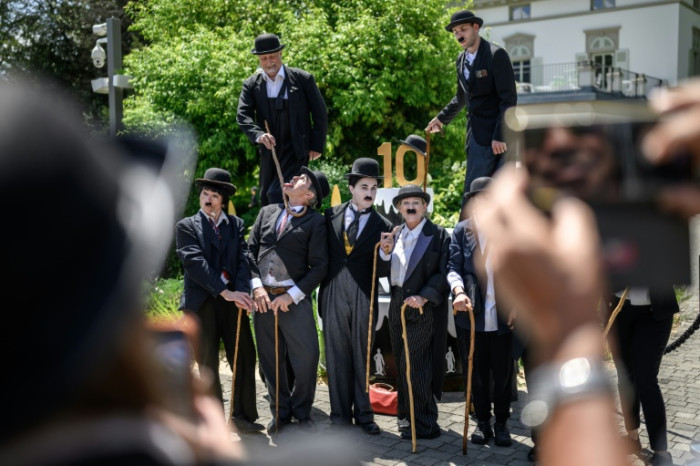 Bangkok Post - Hundreds of Charlie Chaplin lookalikes gather in Switzerland