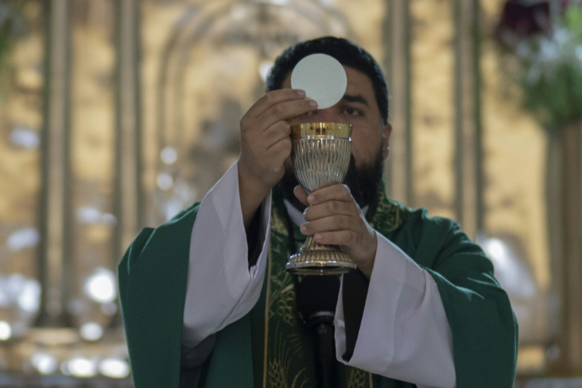 Bangkok Post - Bitter communion: Cuban priests ordered to ration mass ...