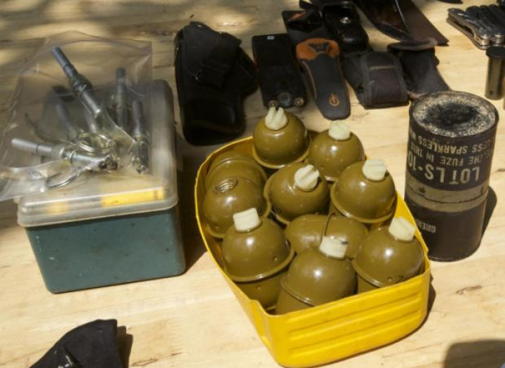 Bangkok Post - Weapons cache linked to red shirts