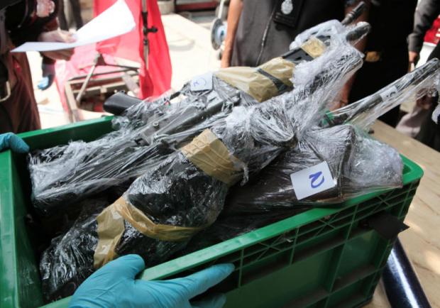 Bangkok Post - Weapons cache linked to red shirts