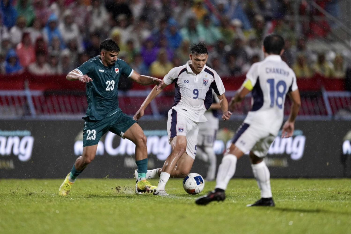 Bangkok Post - Iraq battle through chaos, lift King's Cup